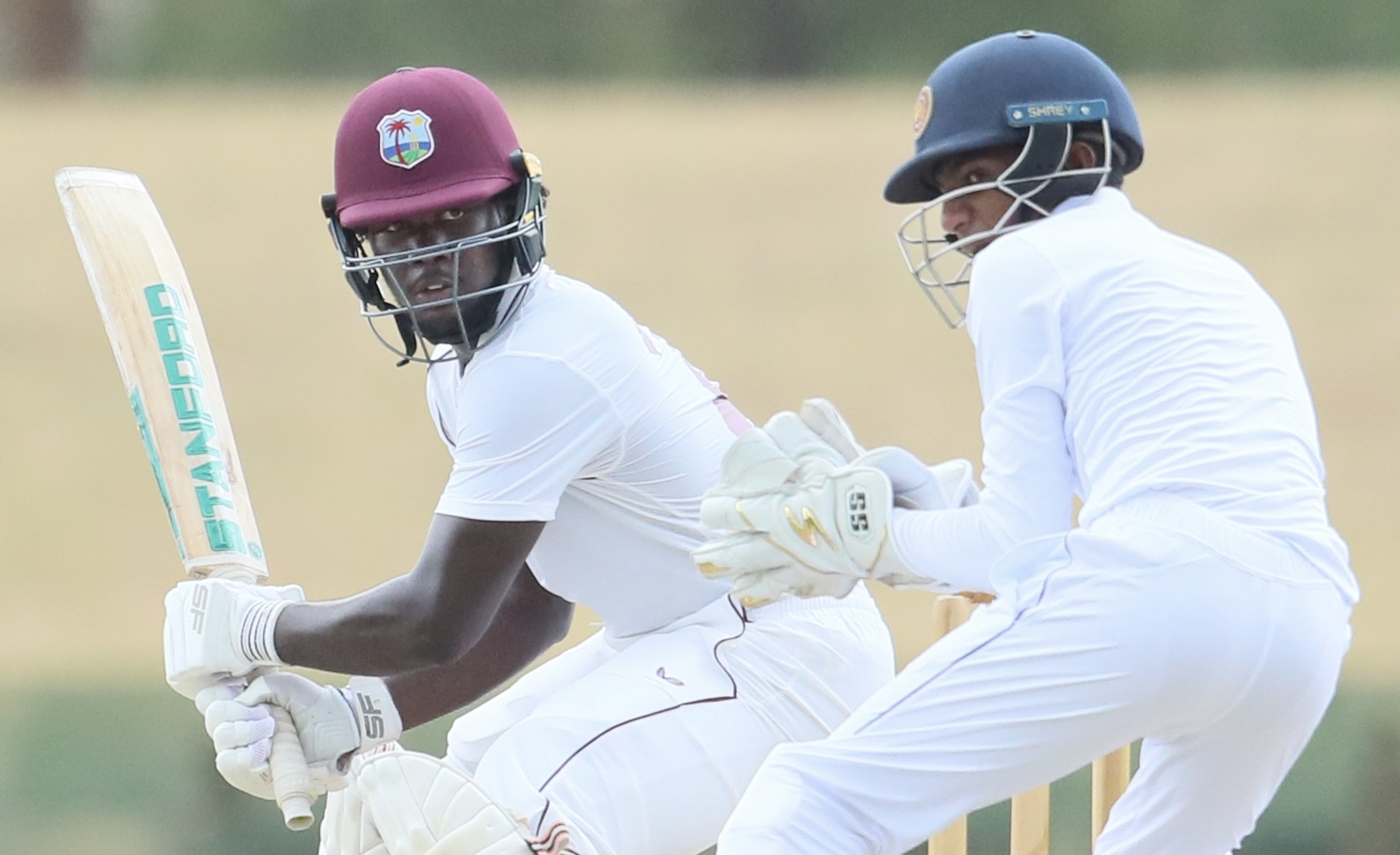 Solid Johnson keeps West Indies afloat on rain-hit day | Windies ...